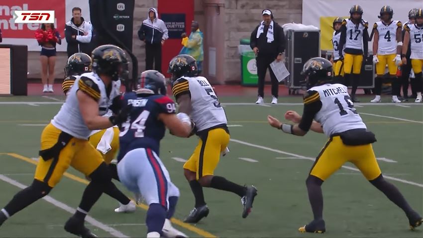 Greg Bell rushes for over 100 yards to lead the Tiger-Cats past the ...